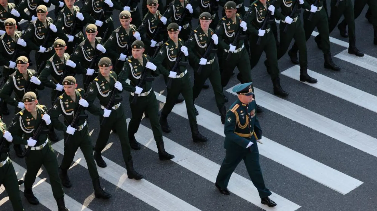 CHINA'S XI STANDS WITH PUTIN AT RUSSIA'S VICTORY DAY PARADE