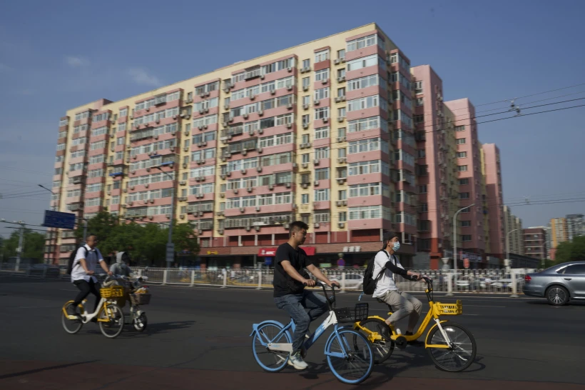 SURVEYS SHOW CHINESE ECONOMY GROWING BUT AT MODEST PACE